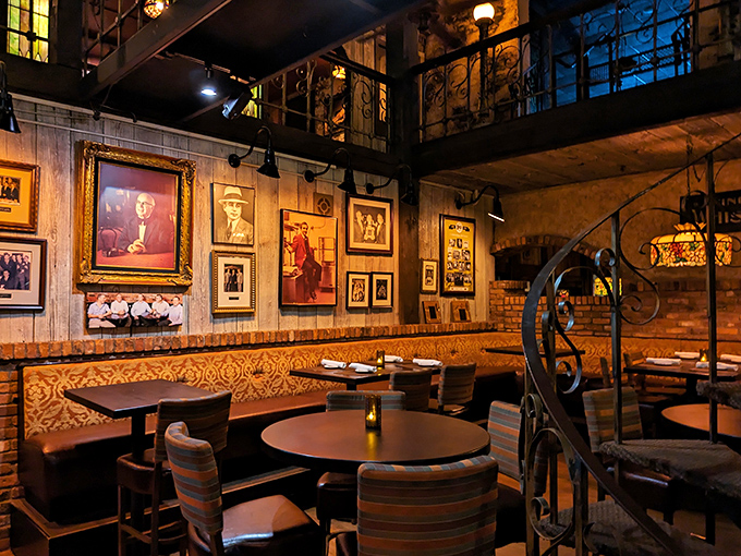 Vintage portraits watch over diners like approving ancestors, while that spiral staircase adds drama to your dinner theater.