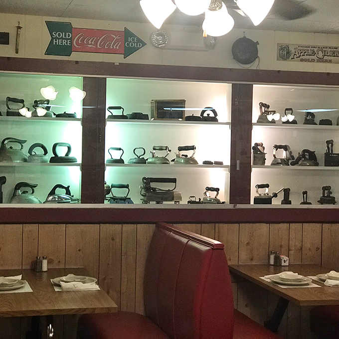 Vintage irons displayed like museum pieces &ndash; because at Monte Ne Inn, even the d&eacute;cor celebrates the honest craftsmanship of a bygone era.