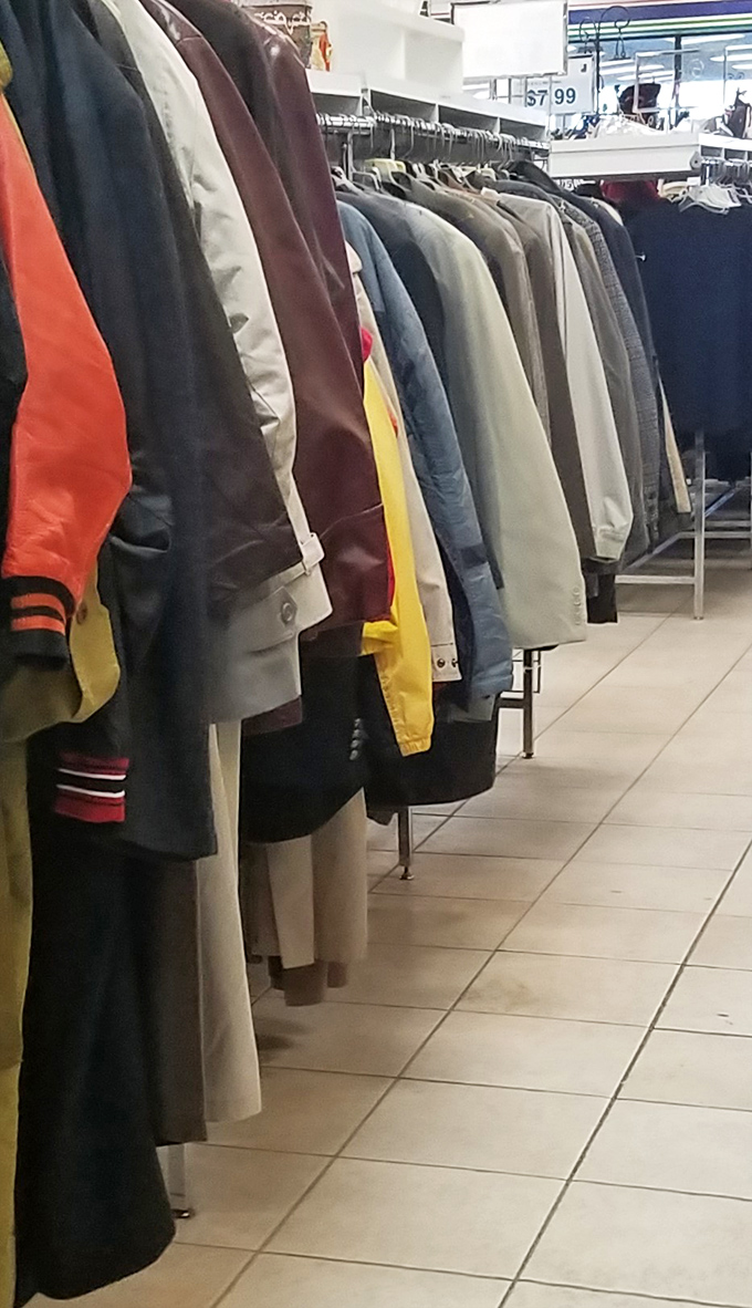 The men's department: where vintage jackets and modern blazers hang together in perfect secondhand harmony.