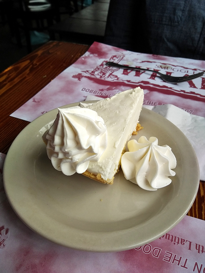 Key lime pie so authentic it should come with a tiny Florida passport&mdash;tangy, sweet, and crowned with clouds of whipped cream.