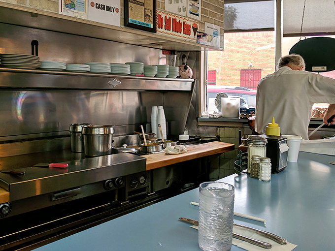 Behind the scenes where the magic happens. The kitchen's well-worn efficiency speaks to decades of perfecting the art of ham preparation.