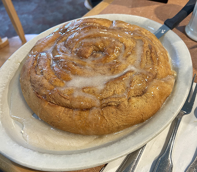 A cinnamon roll of epic proportions glistening with glaze. Some desserts are worth the drive to Maine all by themselves.