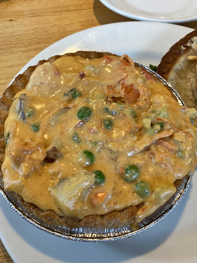 This bubbling masterpiece transforms humble lobster into something that dreams are made of, one forkful at a time.