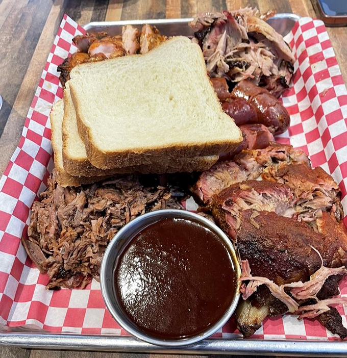 The barbecue platter that launched a thousand road trips. Pulled pork, brisket, hot links, and white bread &ndash; Oklahoma's version of a royal feast.
