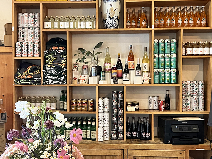 Like a well-organized library of liquid refreshment, Pine & Crane's shelves showcase an impressive array of craft beverages that perfectly complement their Taiwanese treasures.