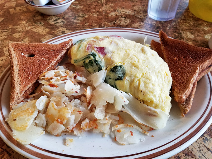 An omelet that's seen the inside of a real kitchen, not a food lab&mdash;stuffed with ham and cheese and paired with potatoes that actually came from the ground.