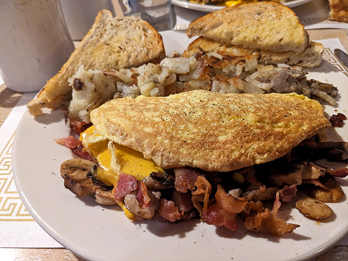 The Western omelet at Fred's doesn't just contain ingredients&mdash;it showcases them, with each bite offering a perfect harmony of flavors alongside golden hash browns.