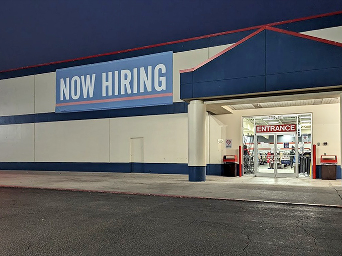 The entrance at dusk feels like the gateway to a nocturnal treasure hunt, where one person's discards become another's discoveries.