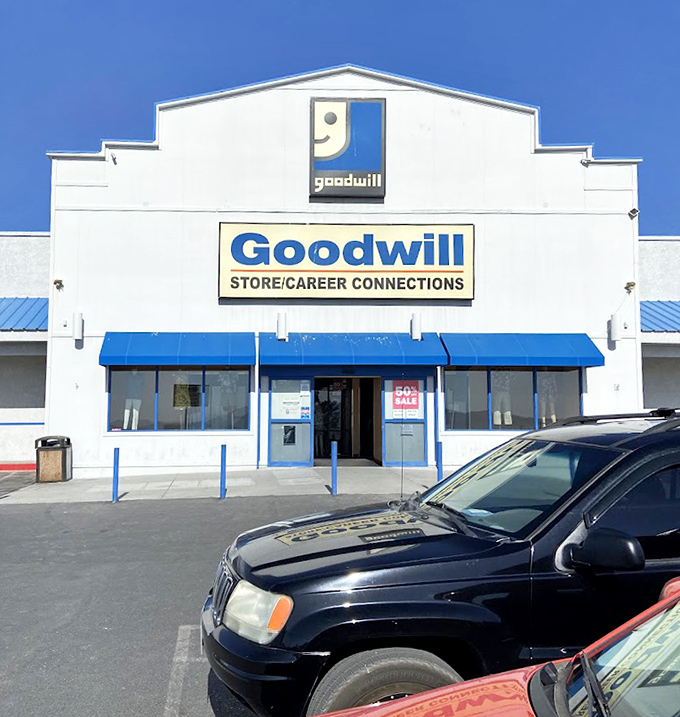 The clean white facade with its cheerful blue trim stands like a beacon of possibility against Nevada's brilliant blue sky.