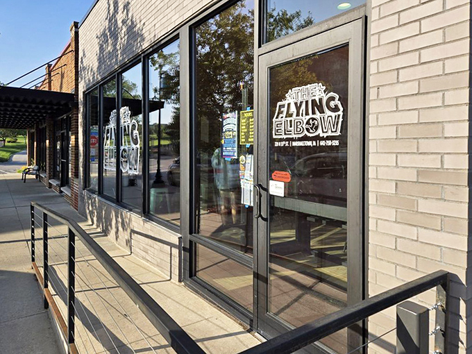Morning light catches the logo just right, inviting hungry passersby to step into a world where sandwiches and wrestling create the ultimate flavor matchup.
