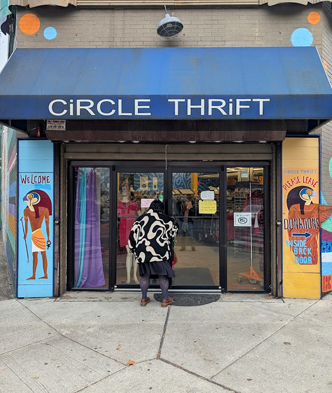 Colorful murals frame the entrance, welcoming shoppers into this Aladdin's cave of secondhand wonders and unexpected finds.