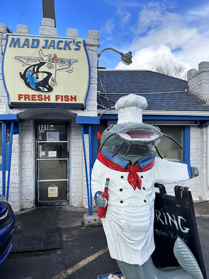The fish chef statue welcomes you with open arms and the promise of seafood that will haunt your dreams. Resistance is futile.