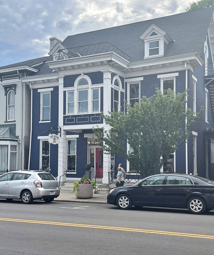 The stately blue building stands like Middletown's culinary embassy, where British tradition meets Ohio hospitality.