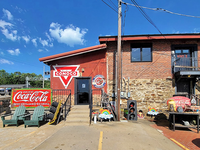 The outdoor entrance showcases vintage Americana that would make Route 66 enthusiasts weep with joy. Coca-Cola, Conoco, and comfortable chairs&mdash;nostalgia served with a side of sunshine.