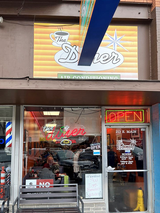 That neon "OPEN" sign might be the most beautiful invitation in all of Norman. The promise of good things awaits behind that glass door.