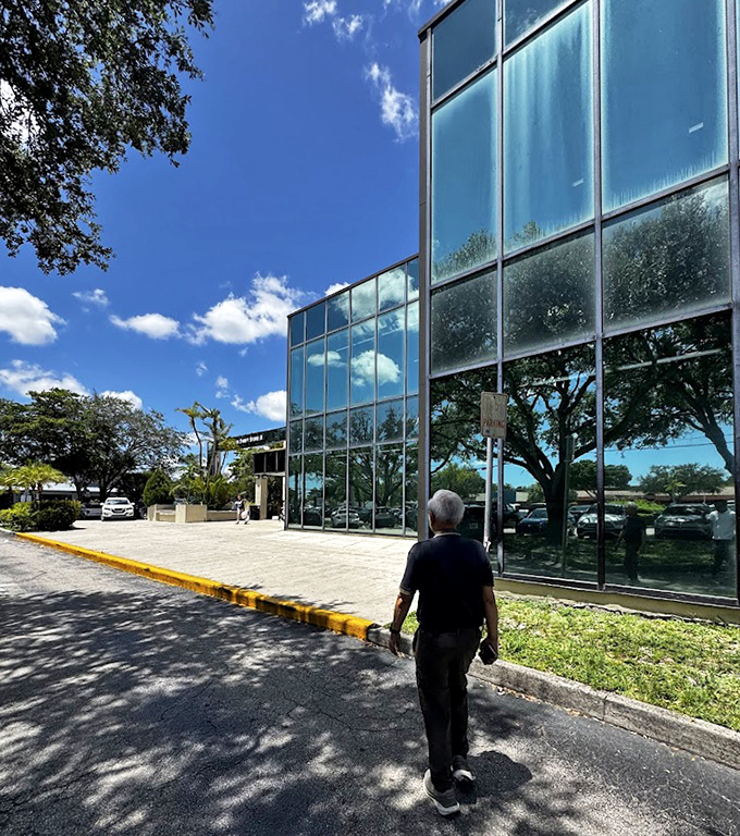 The journey to thrifting nirvana begins with a single step. This glass palace of pre-loved treasures awaits under perfect Florida skies.