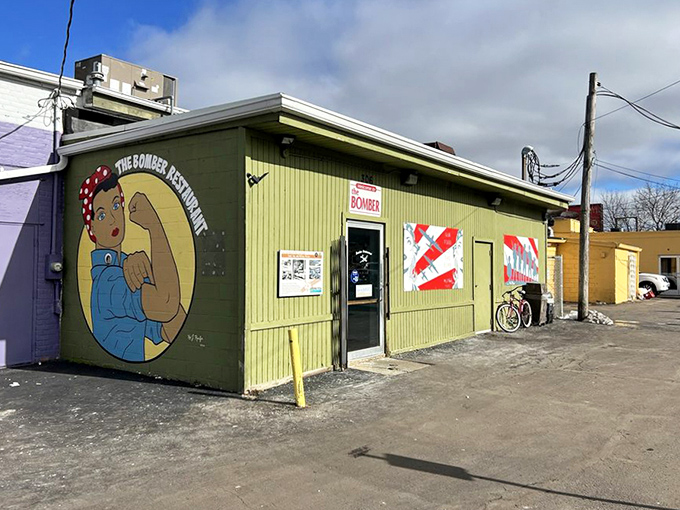 The building's exterior mural flexes some serious muscle, setting expectations for the hearty meals inside.