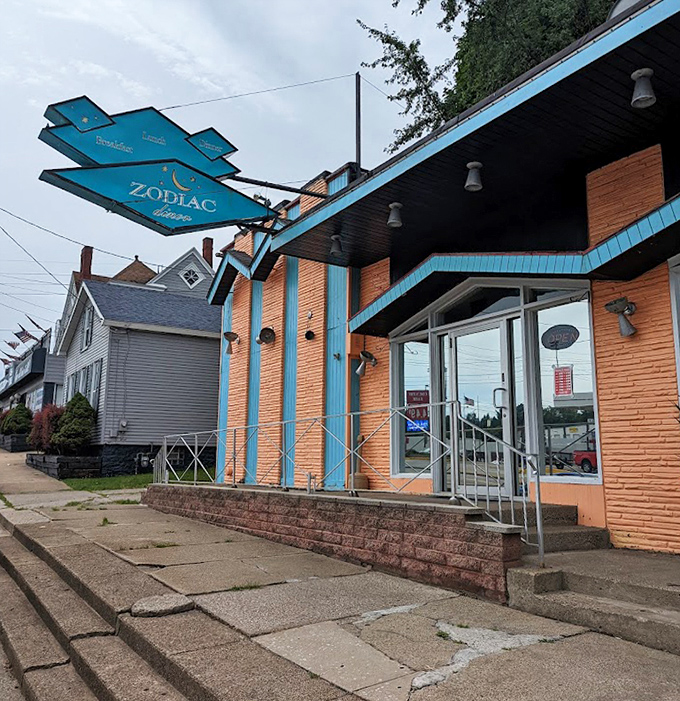 Steps leading to breakfast paradise—the distinctive orange and blue exterior is Erie's most delicious landmark for morning pilgrims.