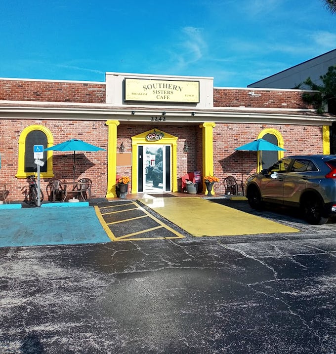 Blue sky, bright yellow trim, and colorful umbrellas &ndash; the cafe's exterior is as cheerful as the food inside is comforting. Florida sunshine in architectural form.