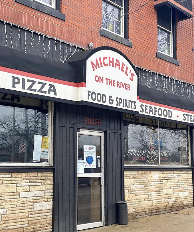 Winter in Michigan can't dim the warm welcome of Michael's. That red brick exterior is like a lighthouse beacon for hungry travelers.