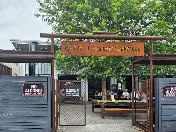 The entrance to barbecue paradise. That rustic sign might as well say "Abandon your diet, all ye who enter here."