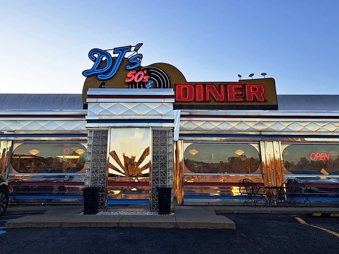 Sunset casts a golden glow on DJ's chrome exterior. Even the building seems to know it's photogenic from every angle.