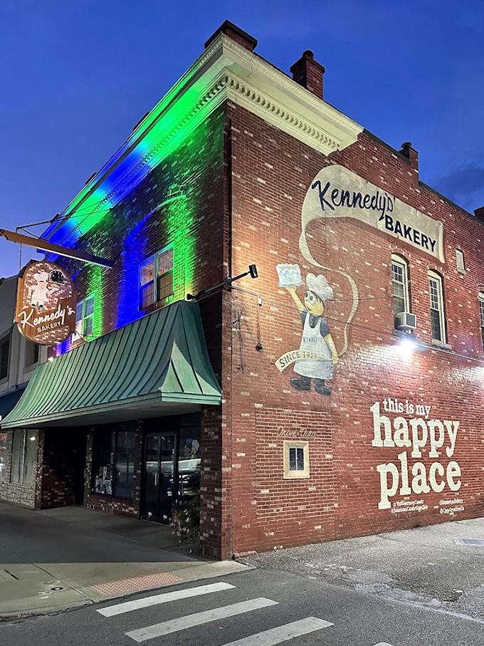 The building glows at twilight like a beacon of hope, reminding passersby that happiness is just inside, wrapped in wax paper.