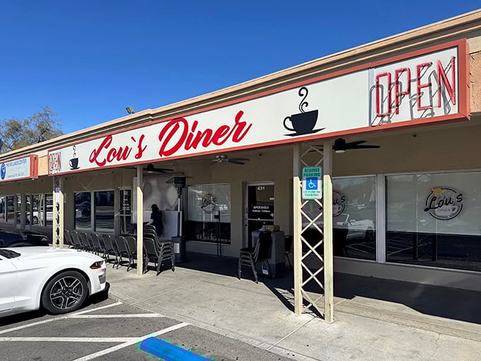 Morning sunshine illuminates Lou's welcoming facade, where locals and in-the-know tourists line up for breakfast worth getting out of bed for.
