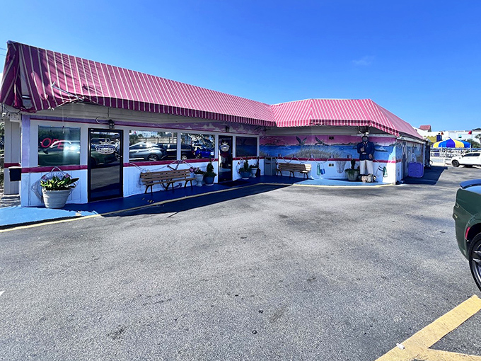 The welcoming exterior with its distinctive pink roof has become a landmark for seafood pilgrims. Many a vacation story begins with, "Remember that amazing place with the pink roof?"