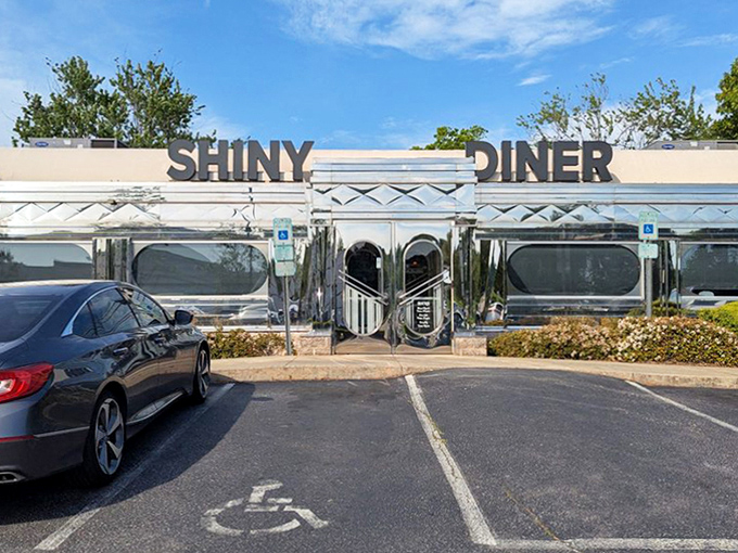 From the parking lot, The Shiny Diner's silver exterior promises what every hungry traveler seeks: honest food without pretension.