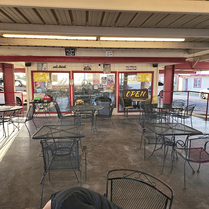 The outdoor dining area waits for its next round of happy customers&mdash;metal chairs that have supported generations of satisfied diners.