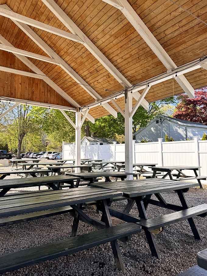 The covered outdoor dining area: Where picnic tables become thrones for seafood royalty and summer memories are made.