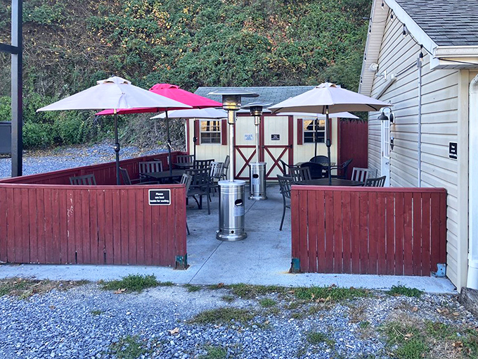 The outdoor dining area offers a charming retreat where summer evenings stretch longer and steaks somehow taste even better under open skies.