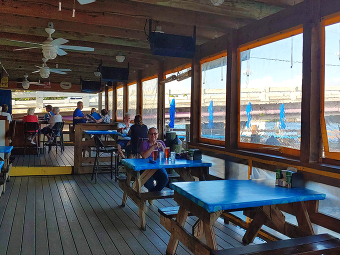 Outdoor seating where the gentle breeze serves as both air conditioning and ambiance enhancer for your seafood feast.