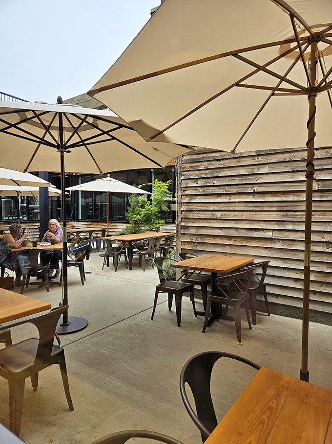 The outdoor biergarten offers al fresco dining under canvas umbrellas, where fresh air makes everything taste just a little bit better.