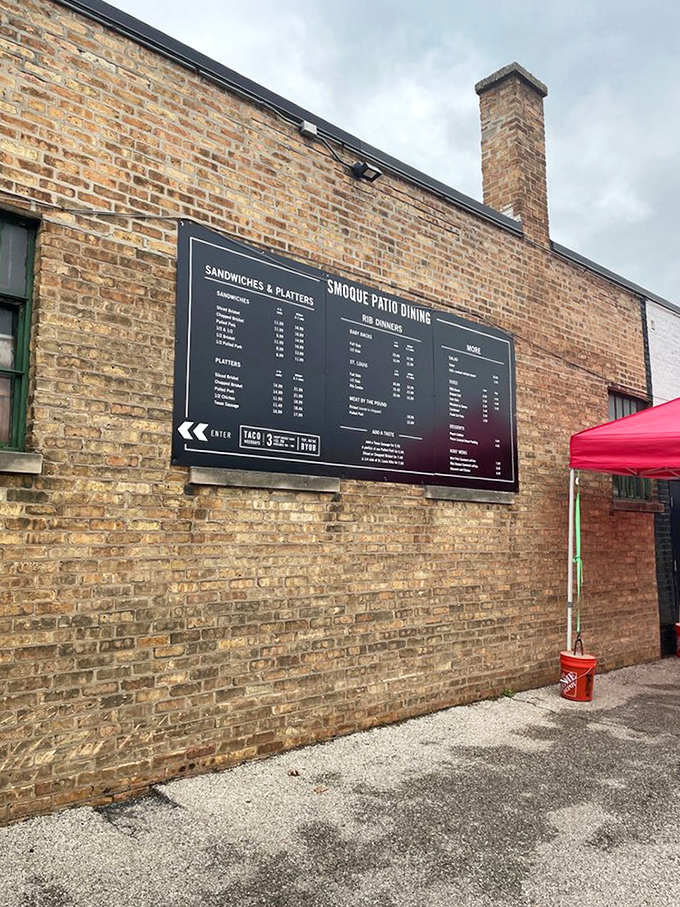 The outdoor menu board&mdash;for those who need to mentally prepare before committing to the glorious meat sweats that await inside.