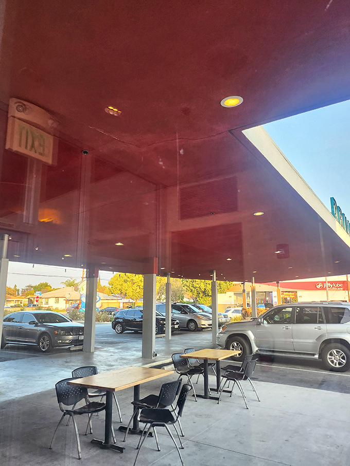 The outdoor seating area offers a front-row view to Southern California life passing by&mdash;burger in hand, sun overhead, contentment all around.