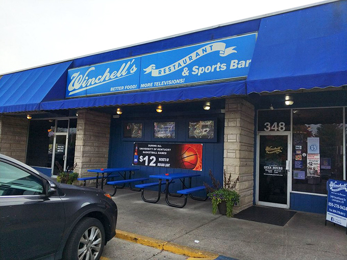 "Better Food! More Televisions!"&mdash;a slogan that perfectly captures Winchell's dual identity. The outdoor seating area welcomes guests before they even step inside.