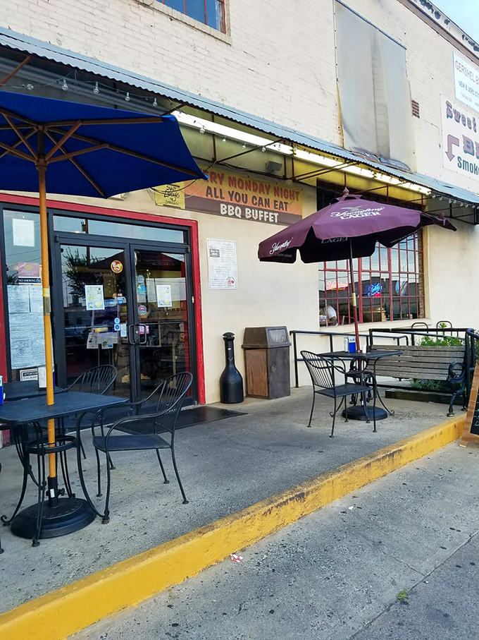 The outdoor seating area whispers promises of Monday night all-you-can-eat barbecue buffets &ndash; a siren song few can resist.