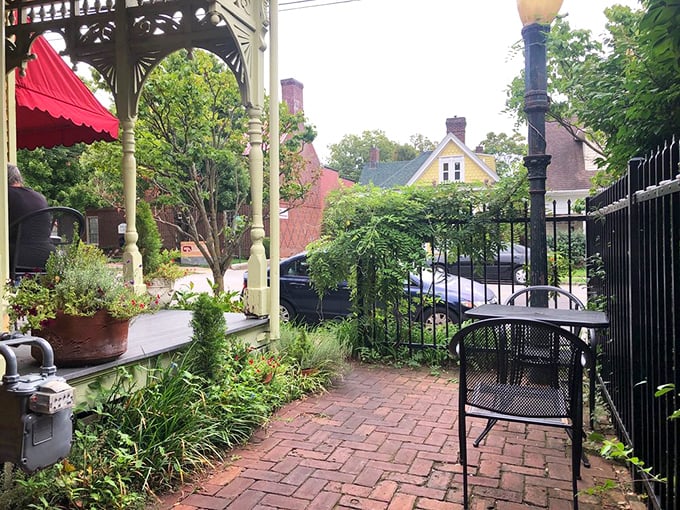 The outdoor seating area, with its brick pathway and lush greenery, offers a peaceful spot to savor your sandwich while watching Lexington life unfold.