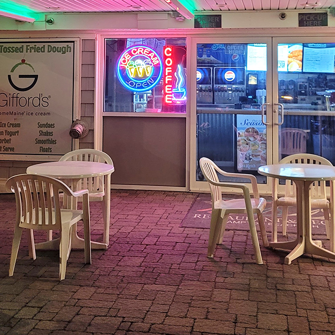 Even the coffee shop seating has that unmistakable coastal charm. The neon glow says, "Yes, we're still open. Lucky you."