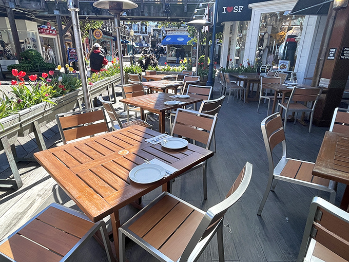 Outdoor tables await with front-row seats to Pier 39's bustling boardwalk—al fresco dining with a side of people-watching.