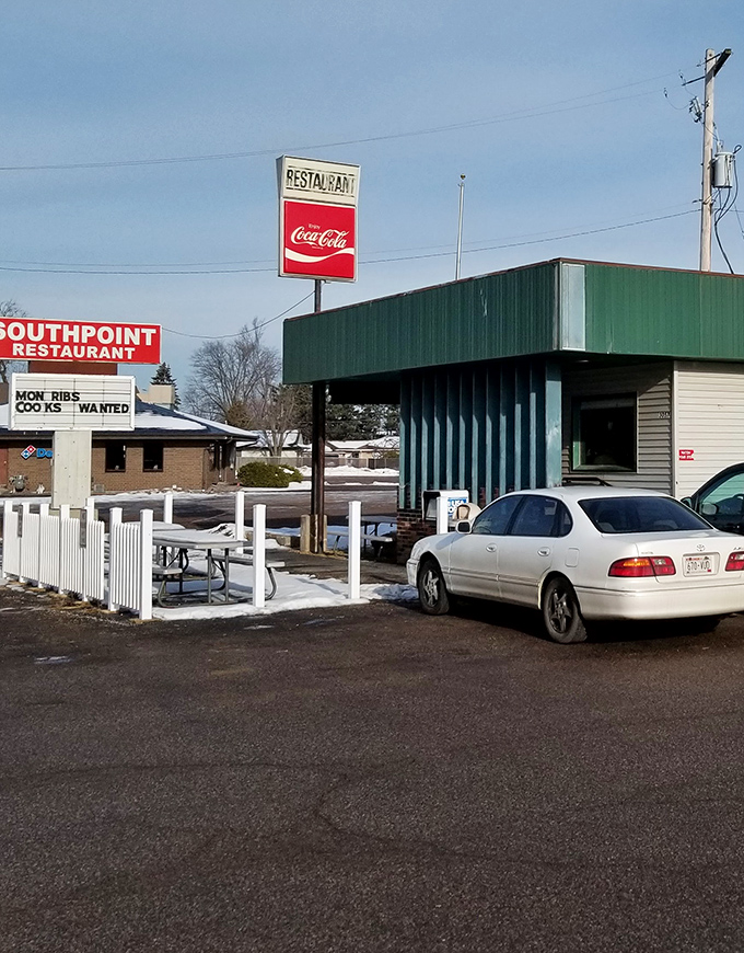 The unassuming exterior hides culinary treasures within. That Coca-Cola sign has guided hungry travelers for generations, like a delicious North Star. 