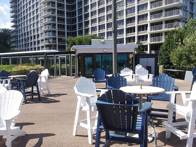 Adirondack chairs invite you to linger longer, because rushing away from this view should be illegal in all fifty states. Lake Erie's front-row seats.