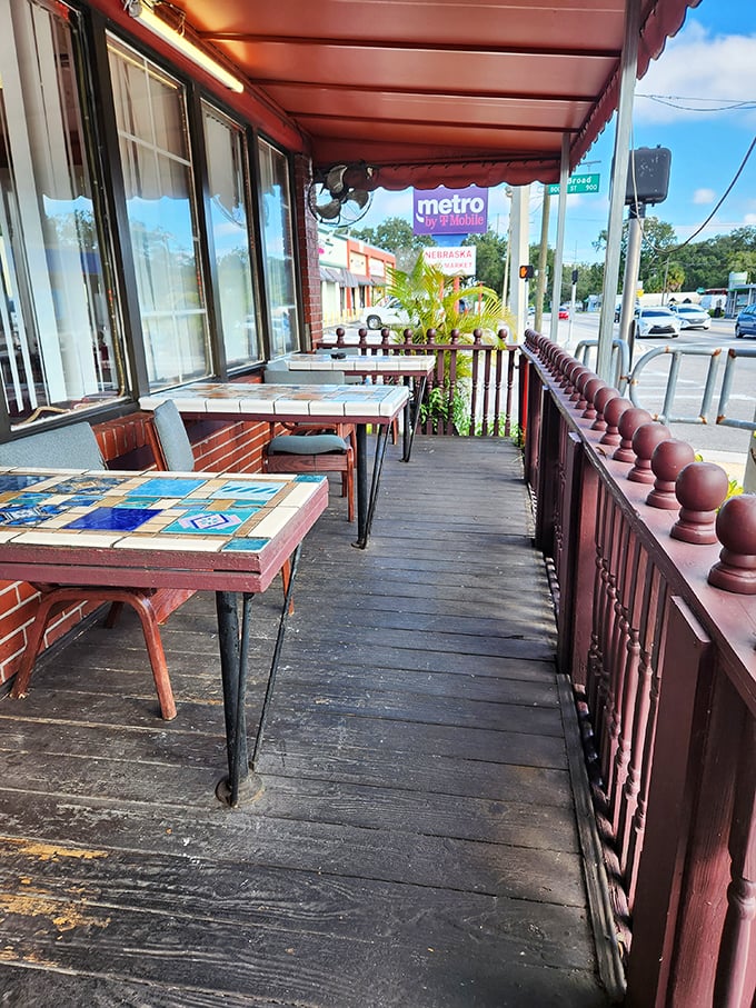 The outdoor patio with its mosaic-topped tables offers a breath of Florida air between bites of diner perfection.