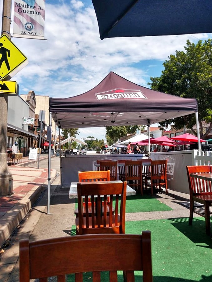 Outdoor seating where the California sunshine meets Texas-style barbecue in a delicious cultural exchange program.