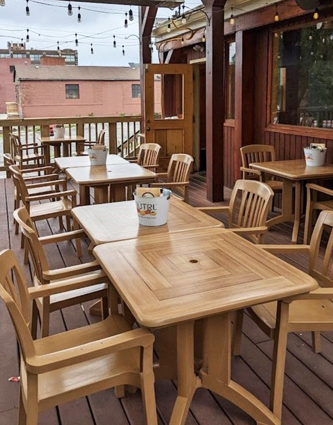 The outdoor patio offers al fresco dining where summer breezes complement burger steam in nature's perfect pairing.