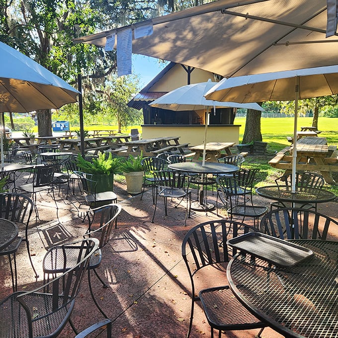 The outdoor seating area invites you to linger under umbrellas, turning a bakery visit into a proper afternoon escape.