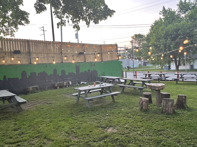 String lights transform the outdoor dining area into a magical garden party as evening approaches. Al fresco dining at its Nashville best.