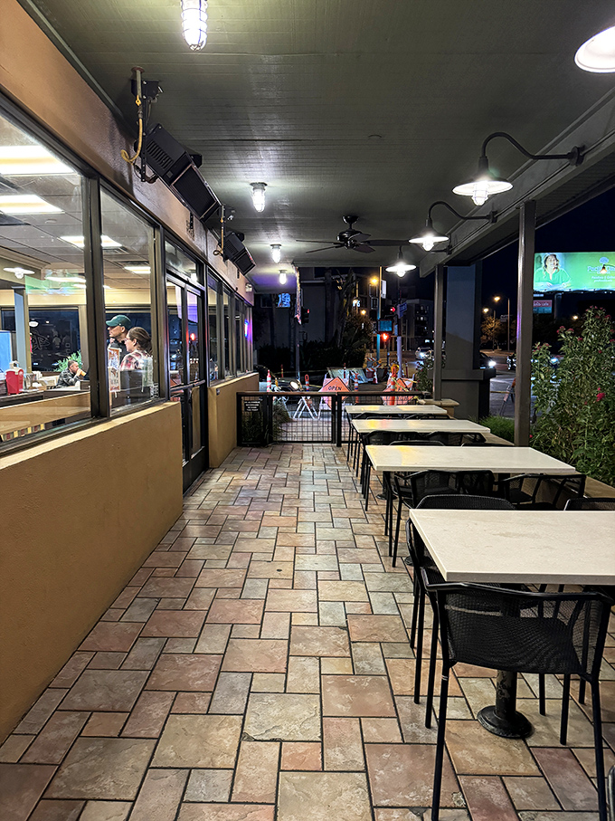 The outdoor patio—where Pasadena nights become the perfect backdrop for conversations fueled by good food and the gentle hum of Colorado Boulevard.
